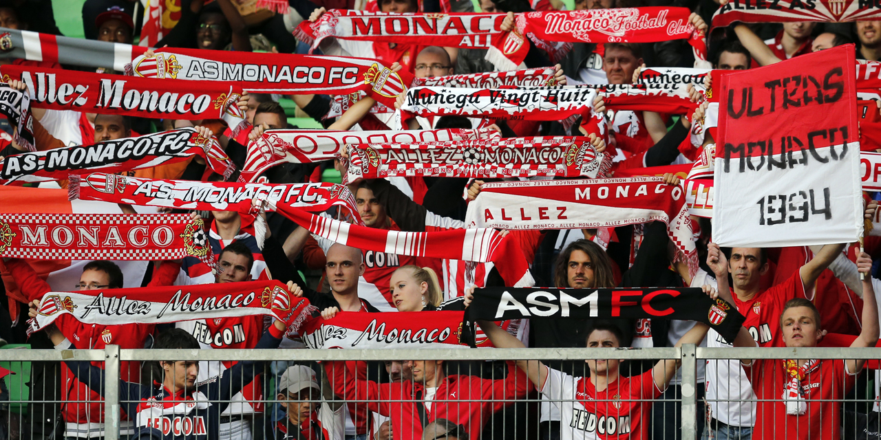 AS Monaco's supporters cheer for their team before their French Ligue 1 ...